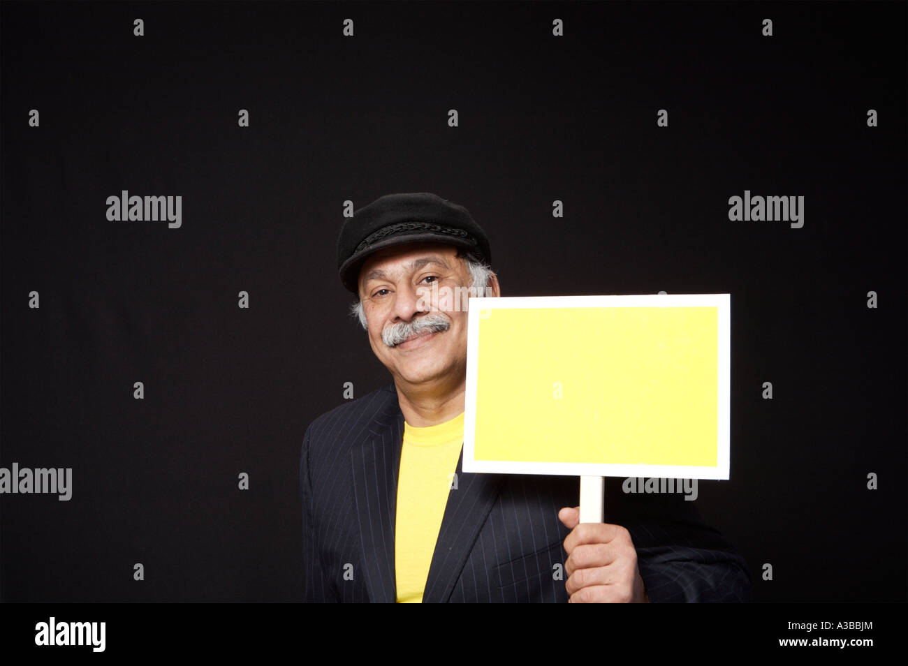 man and sign Stock Photo - Alamy