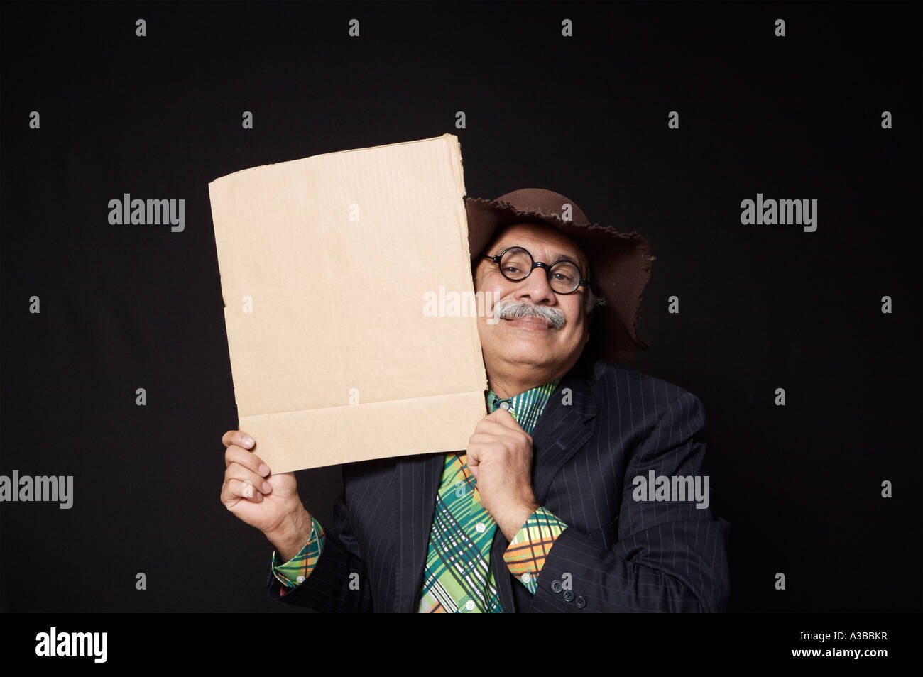 man and sign Stock Photo - Alamy