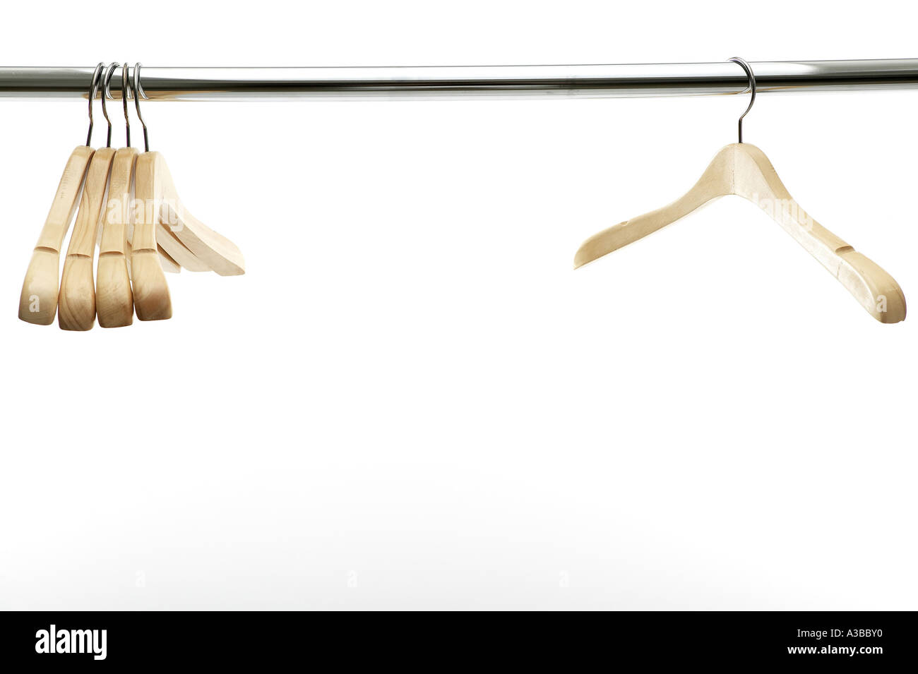 Wooden hangers on the rack Stock Photo - Alamy