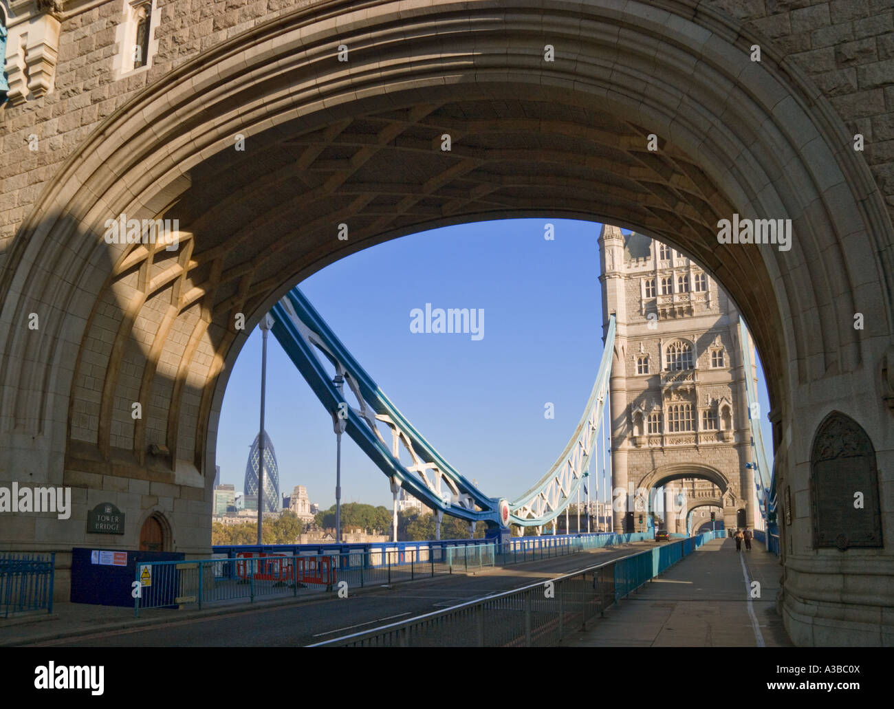 Archway of Tower Bridge with the Swiss Re Tower London Gherkin beyond ...
