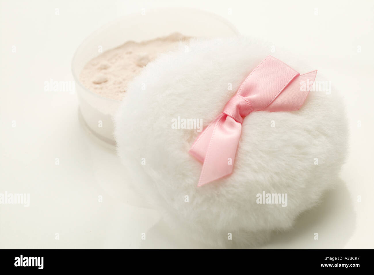 Foundation powder and puff Stock Photo - Alamy