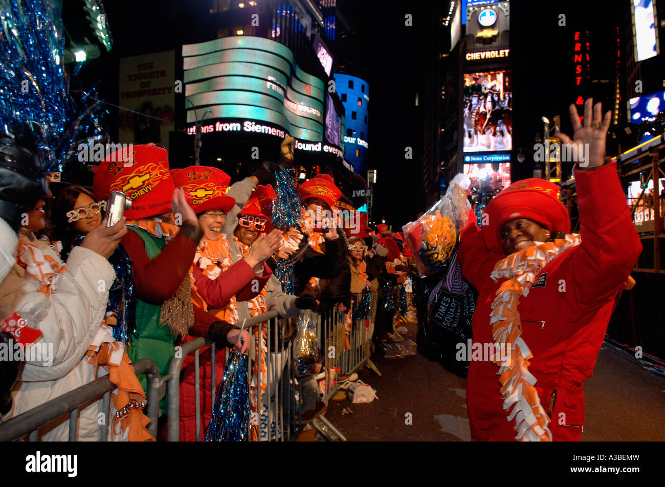 An employee of the Times Square Alliance entertains some spectators in ...