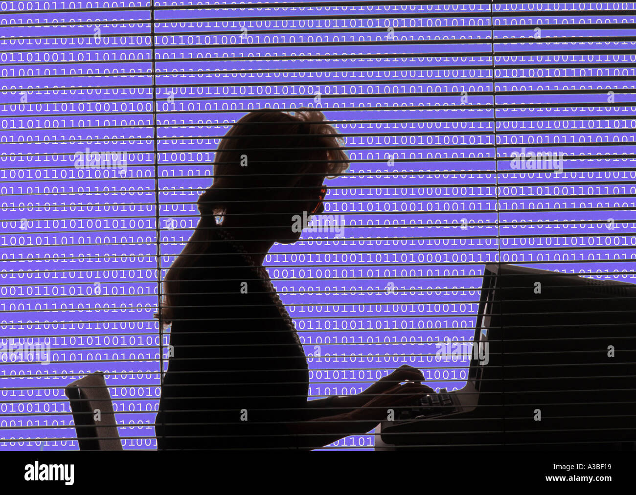 Silhouette of woman working on computer Stock Photo - Alamy