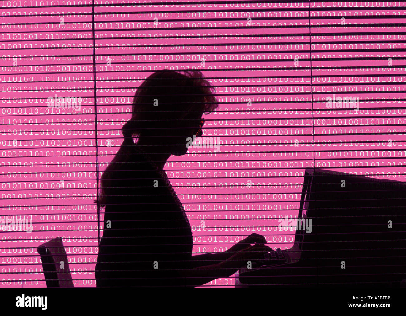 Silhouette of woman working on computer Stock Photo - Alamy