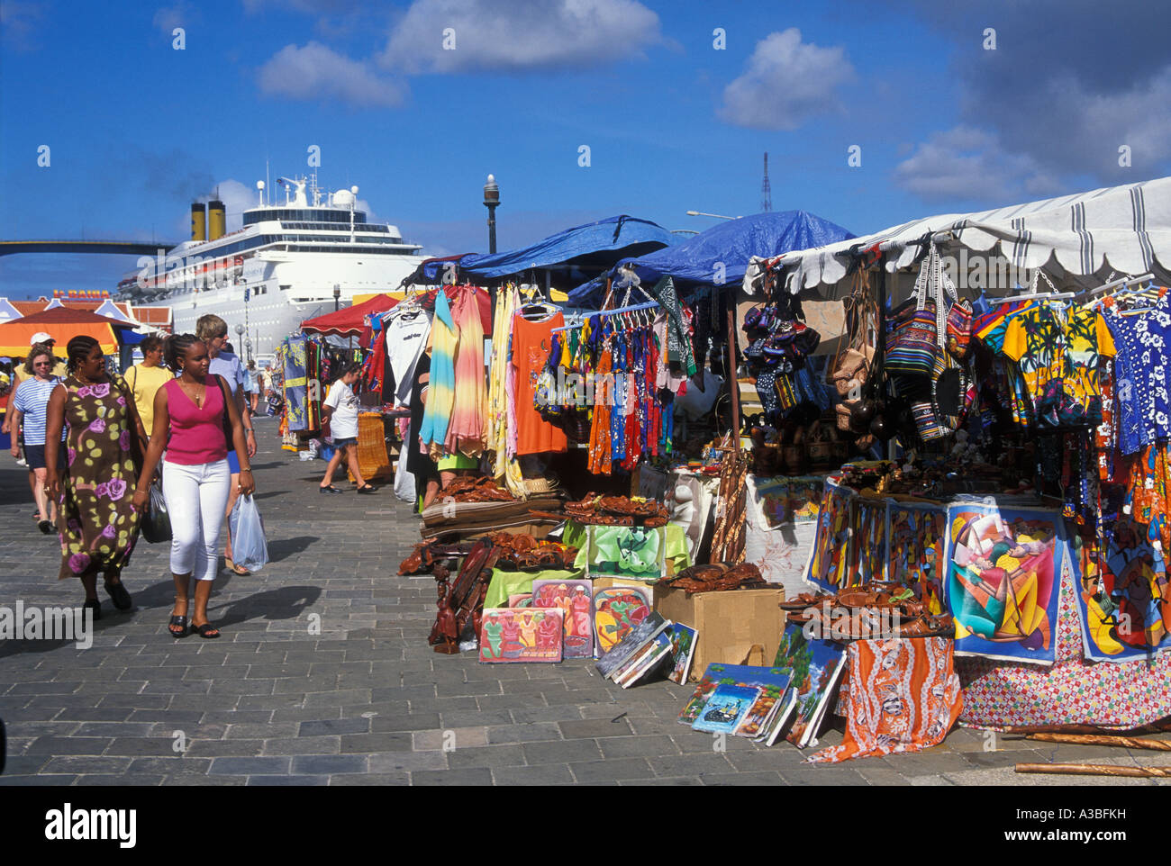 Street vendor stalls and cruise ship on Boat Day Otrobanda waterfront ...