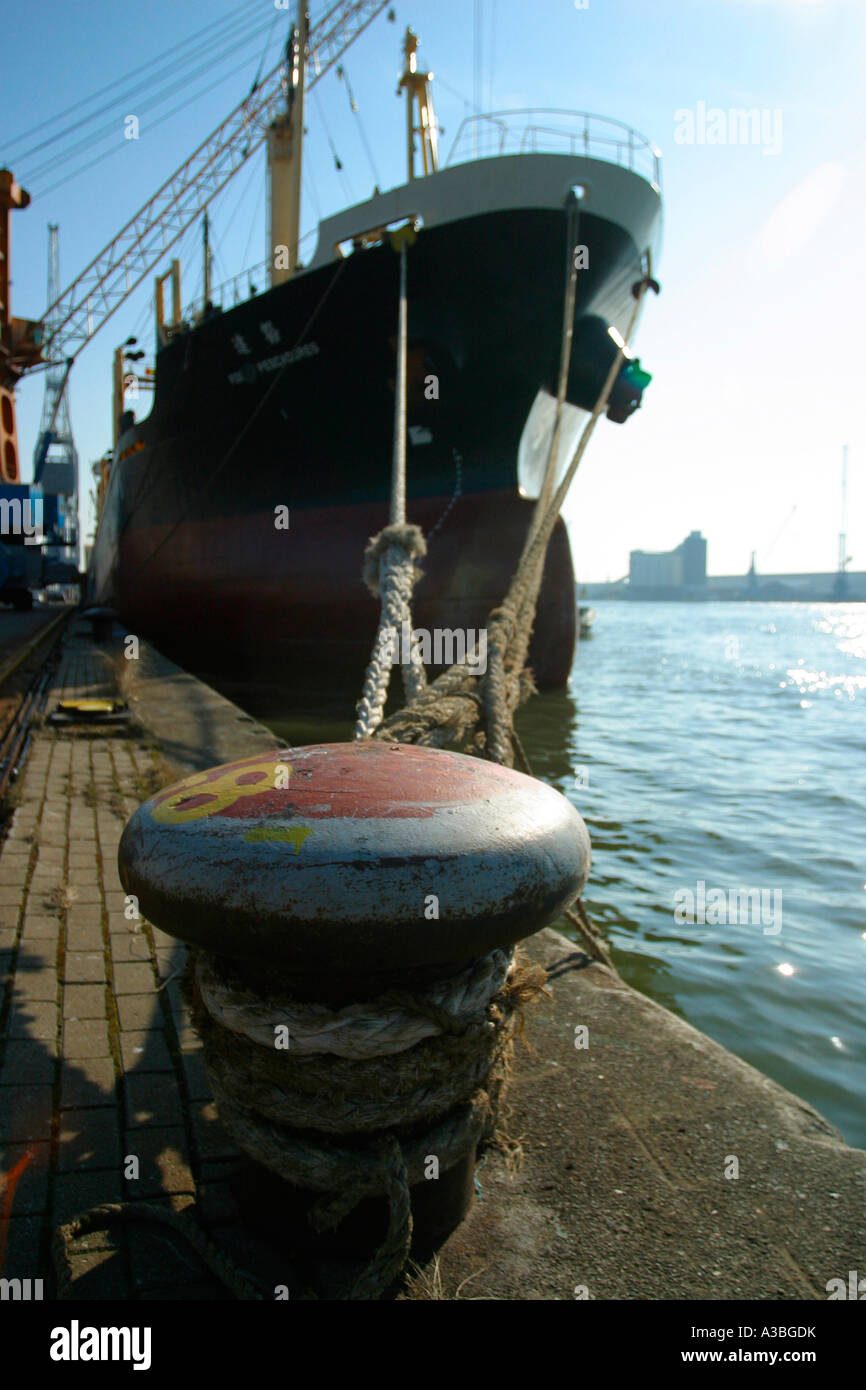 cargo boat at quay Stock Photo - Alamy