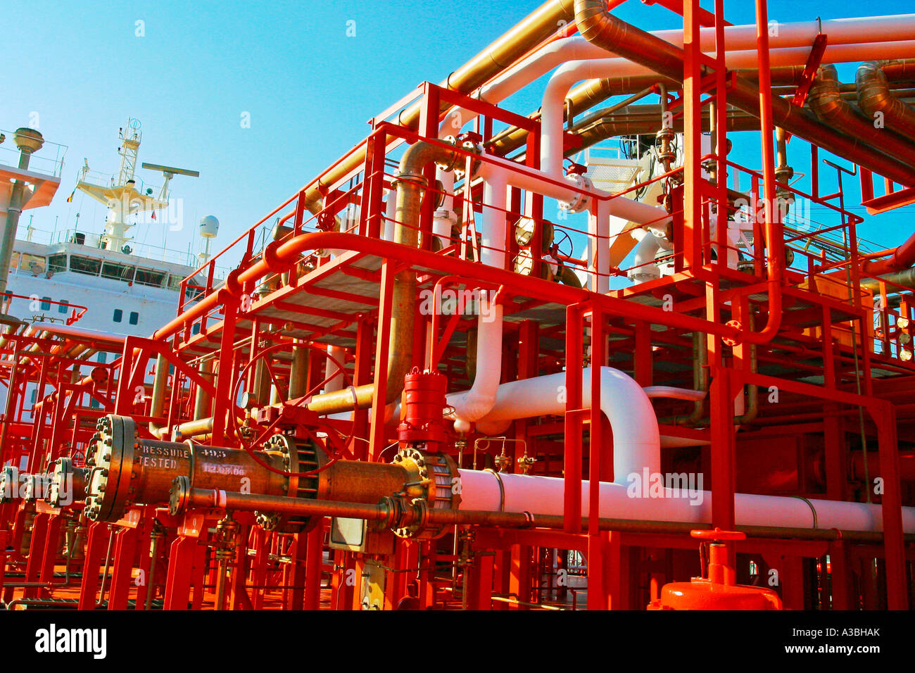 Bright red gas pipes Stock Photo - Alamy