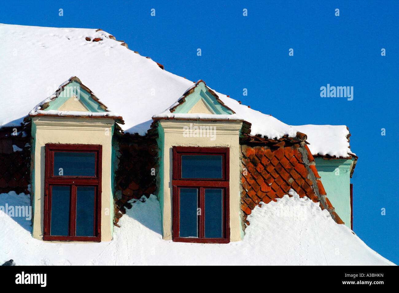 rooftop window and snow Stock Photo - Alamy