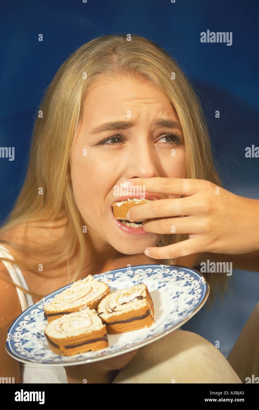 Overeating sweets hi-res stock photography and images - Alamy