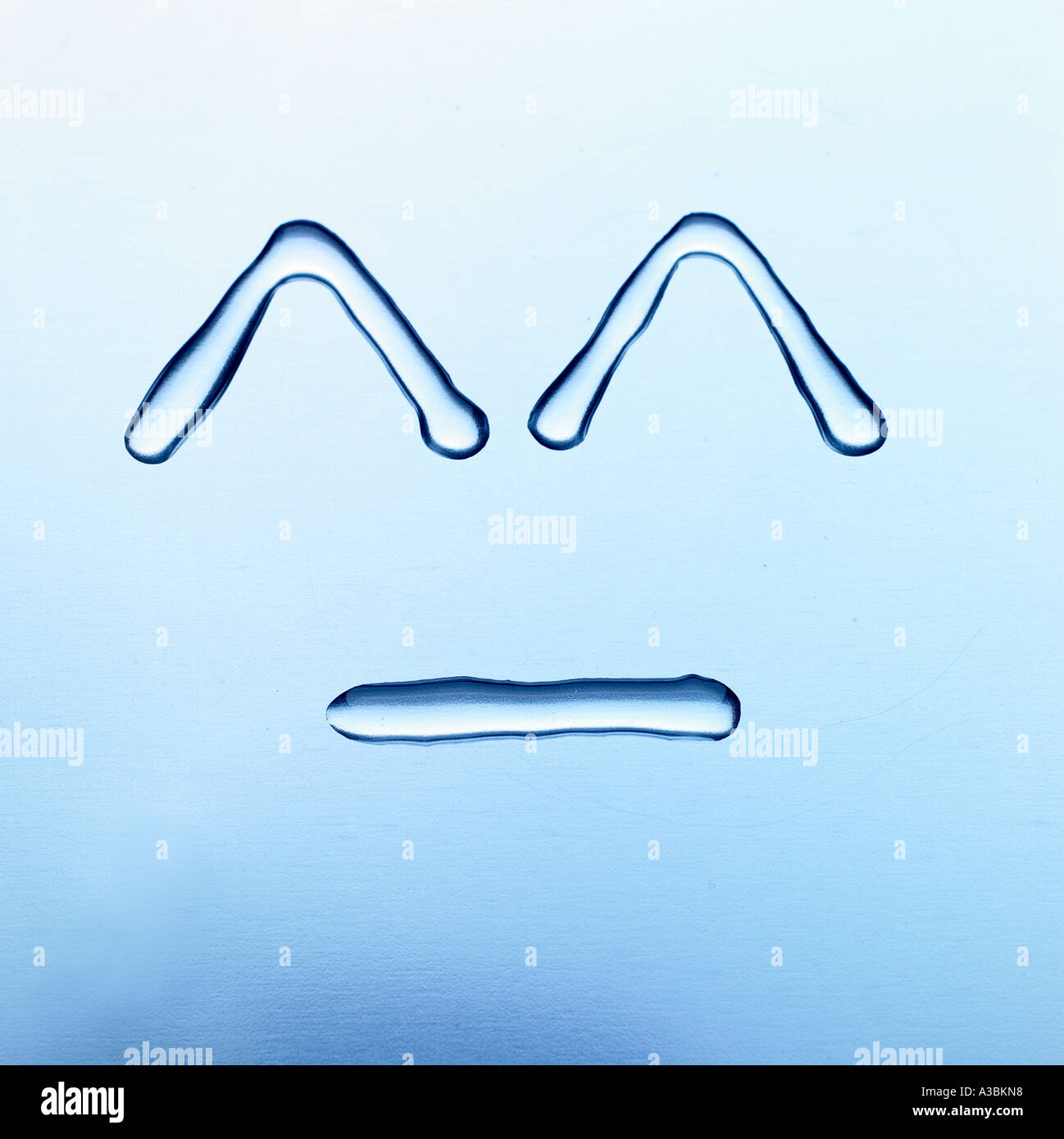 a smiling face made out of water Stock Photo - Alamy