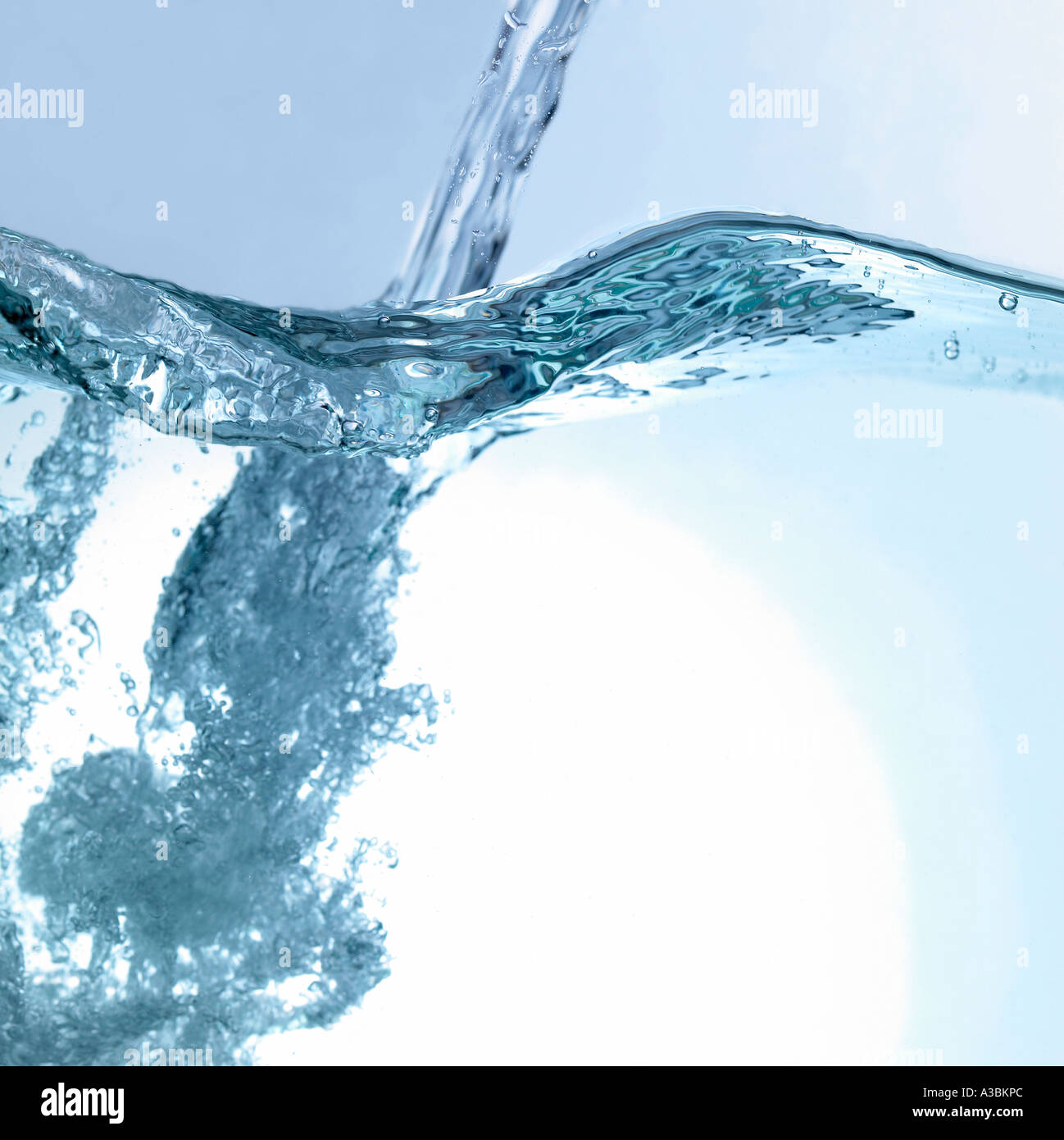 water poured into the running water Stock Photo - Alamy