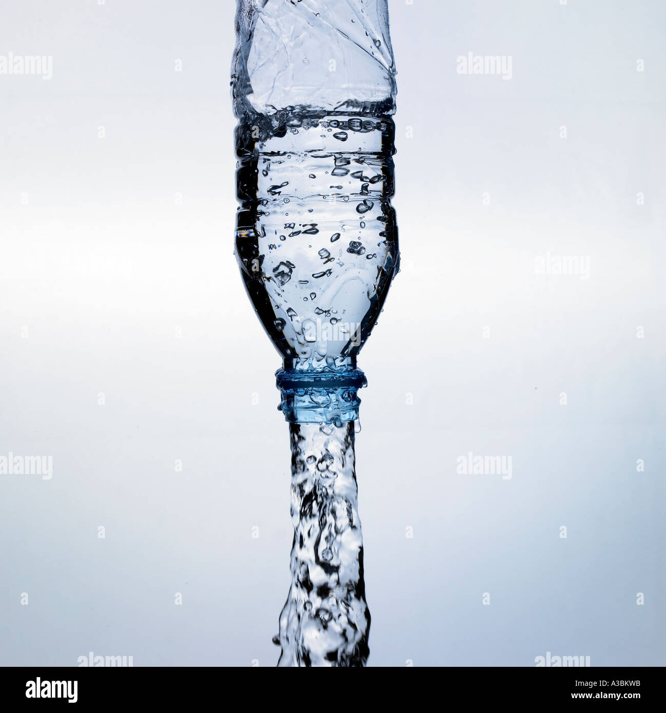 one cup of water and Stream of water bottle Stock Photo - Alamy