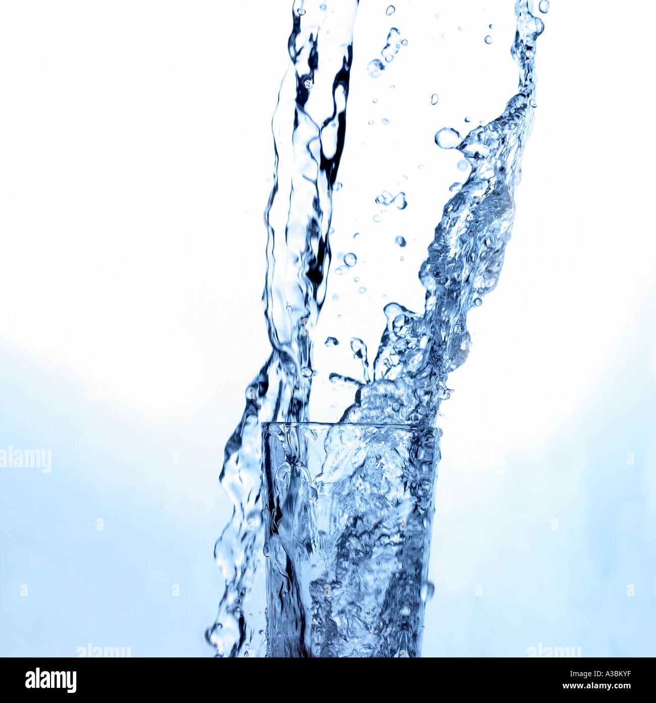 one cup of water and Stream of water bottle Stock Photo - Alamy