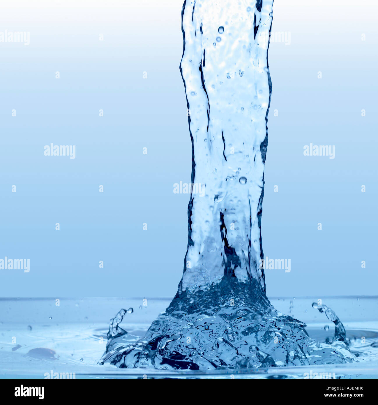 a pillar of water flowing from the bottom Stock Photo - Alamy