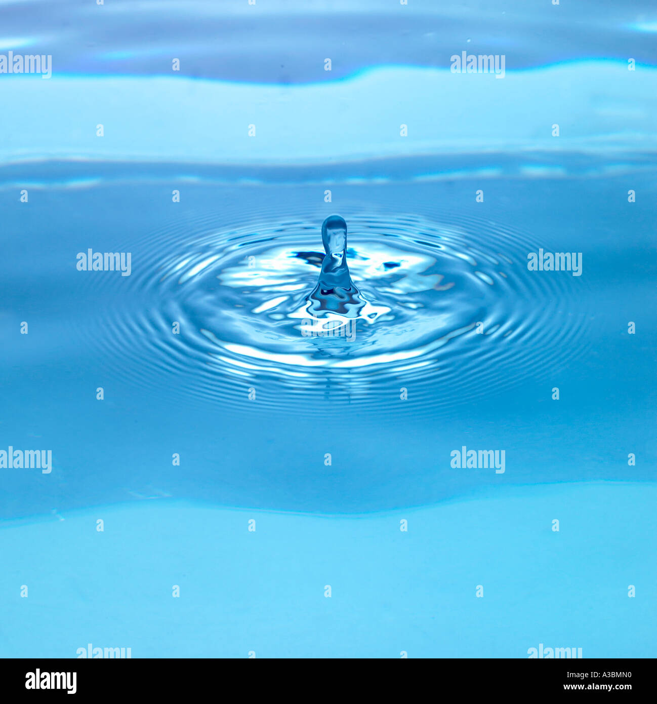 a water drop with rippling effect Stock Photo - Alamy