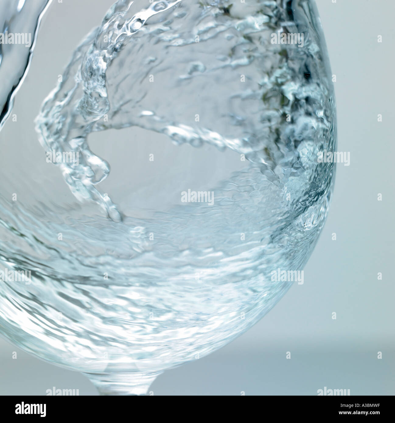 water flowing in a wine glass Stock Photo - Alamy