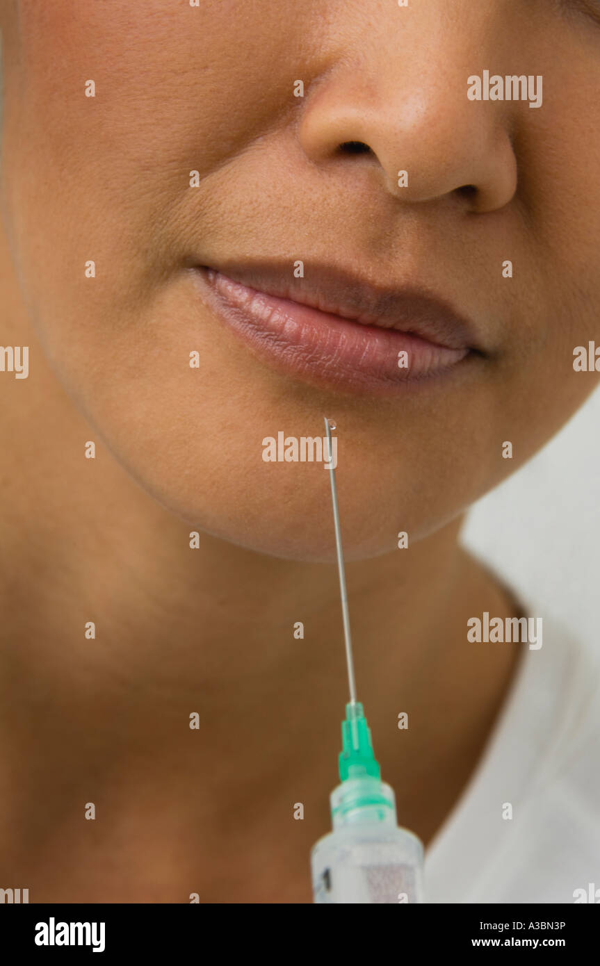 Chinese woman receiving botox injection hi-res stock photography and ...