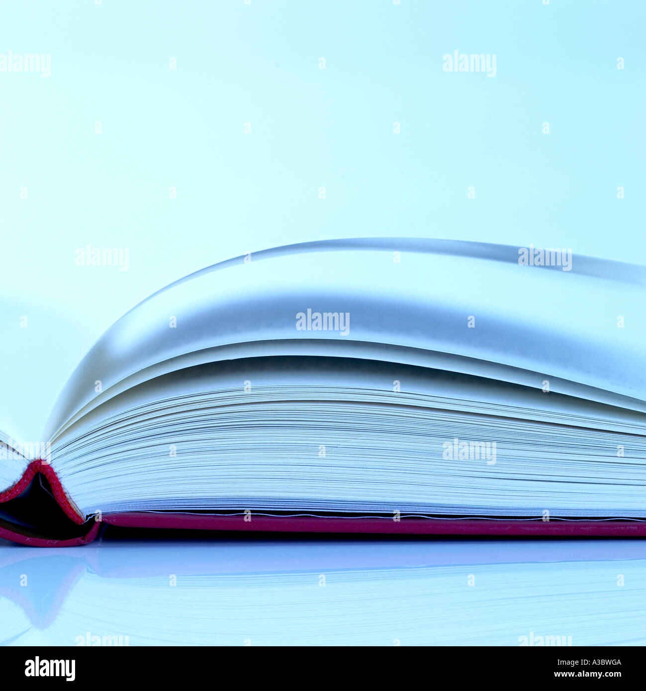 an open book with red covers Stock Photo - Alamy