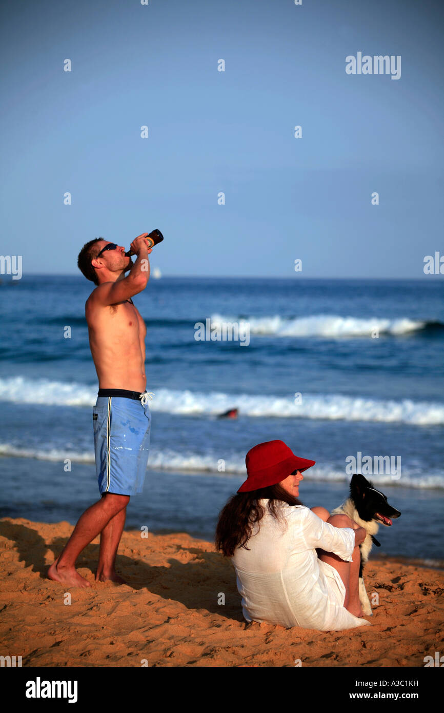Australian beach lifestyle relaxed with beer and dogs Macmasters beach ...