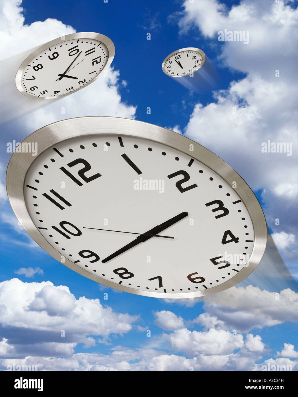 Clocks racing across the sky portraying the slogan Time Flies Stock ...