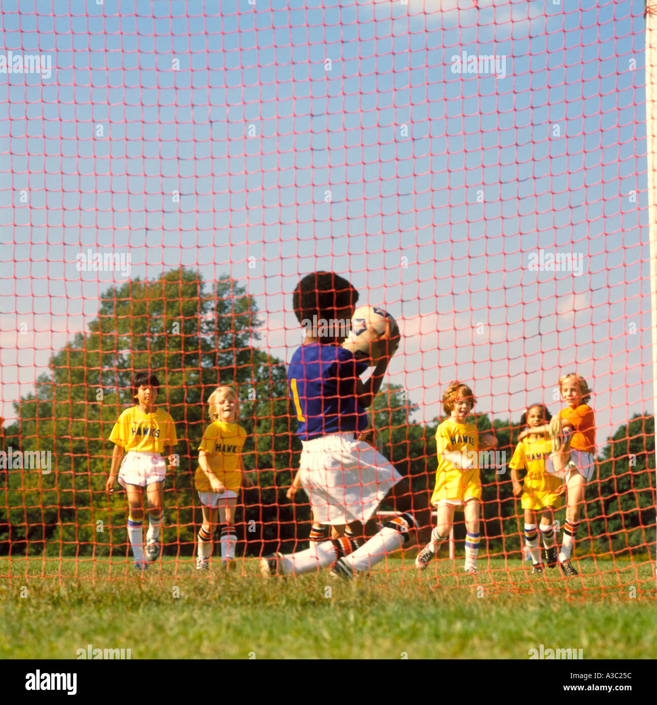 Asian boy playing soccer uniform hi-res stock photography and images ...