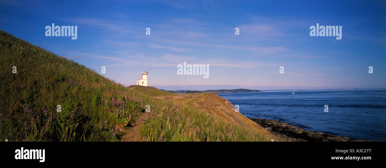 Panoramic view of blue sky Cattle Point Lighthouse and the Pacific ...