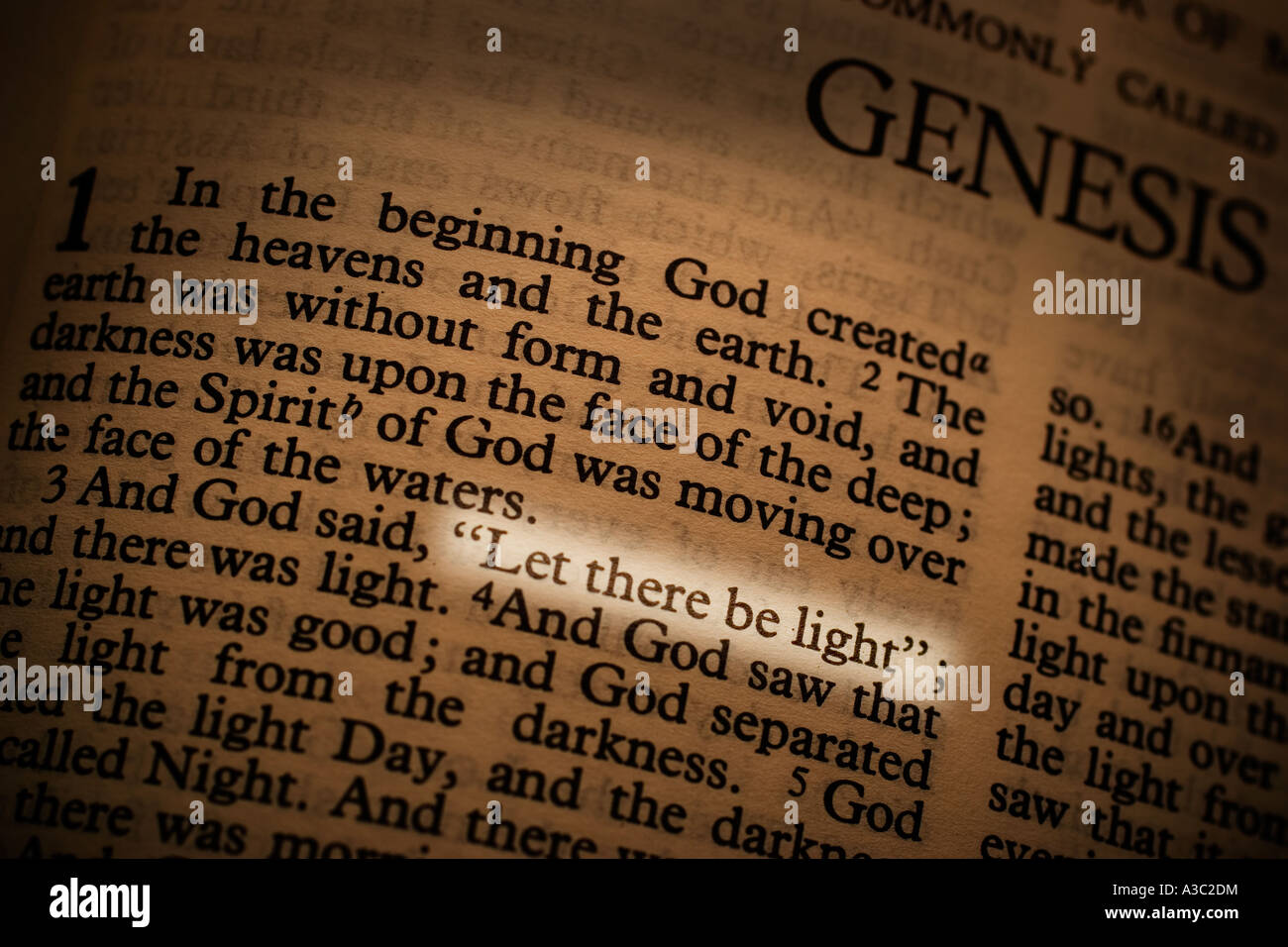 First page of the Book of Genesis in the Bible with the words Let there ...
