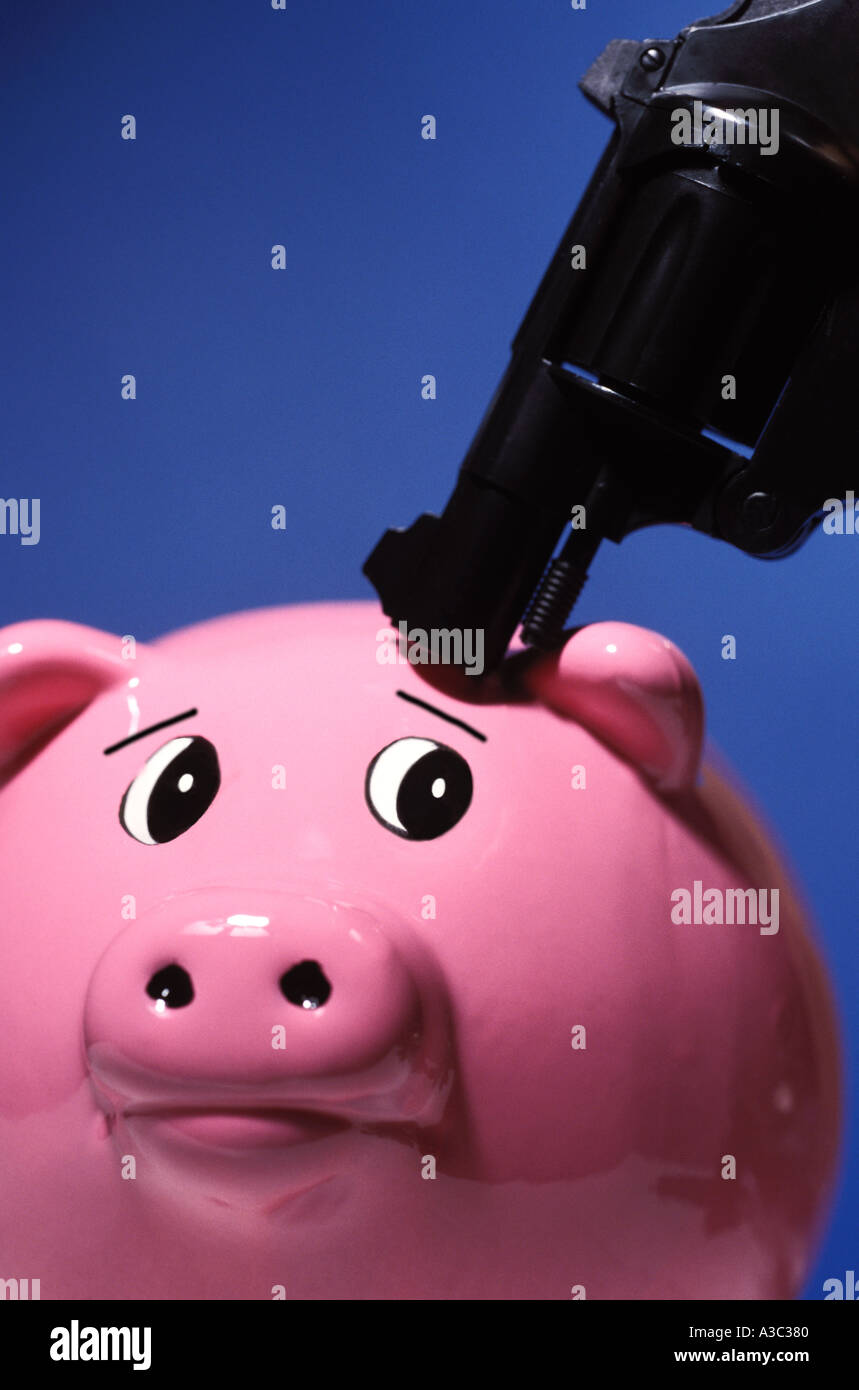 Piggy bank hold up armed robbery Stock Photo - Alamy