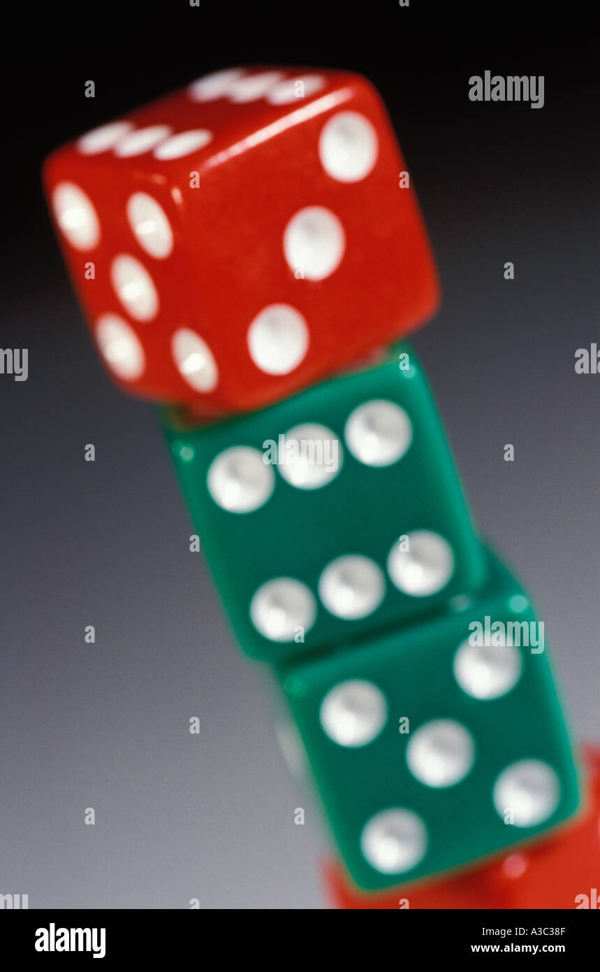Red and green dice falling Stock Photo - Alamy