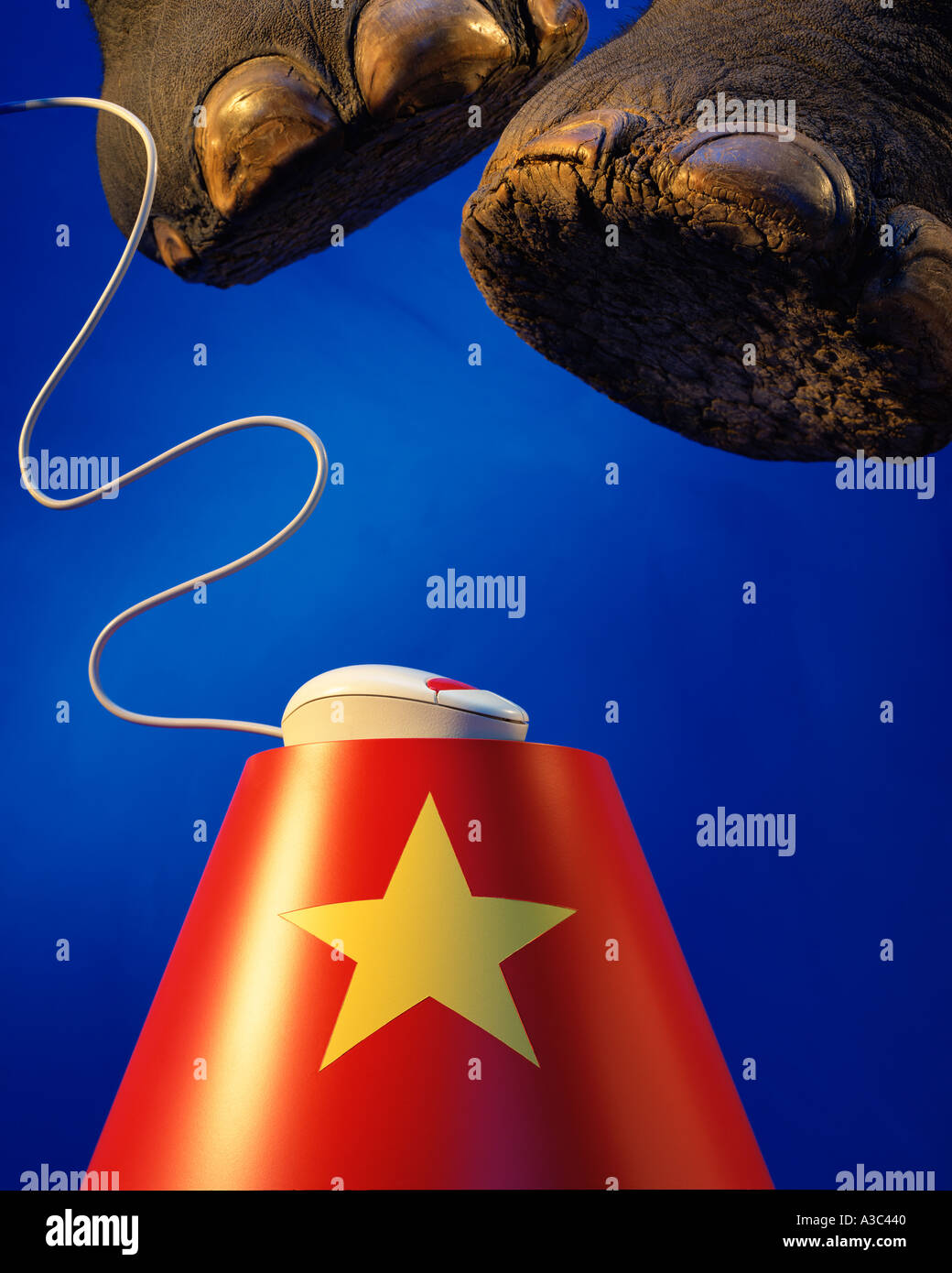 Computer mouse scaring an elephant on a circus platform by Pete ...