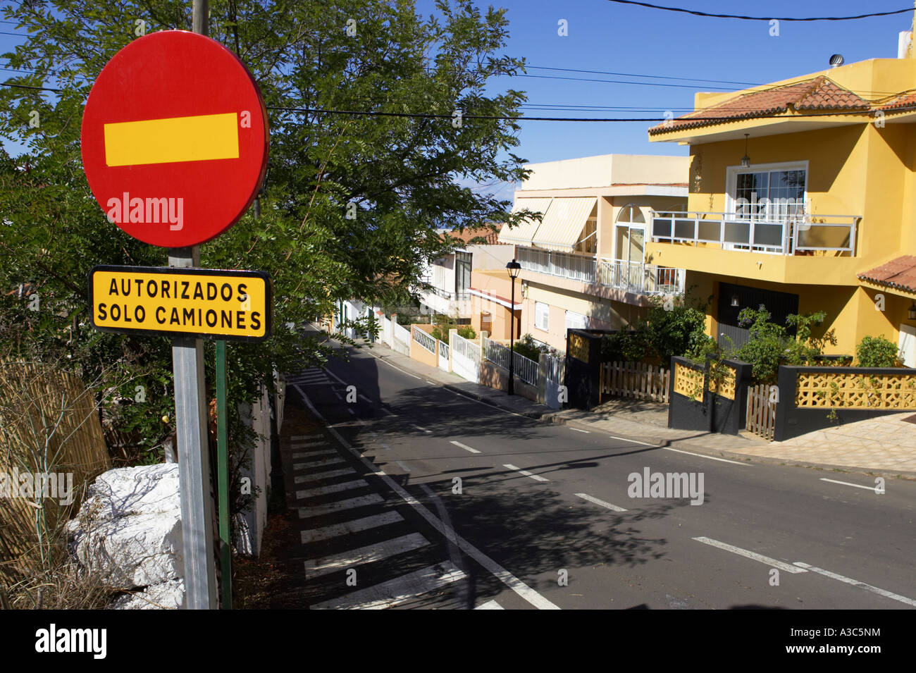 red and yellow bar no entry circular traffic sign with only trucks ...