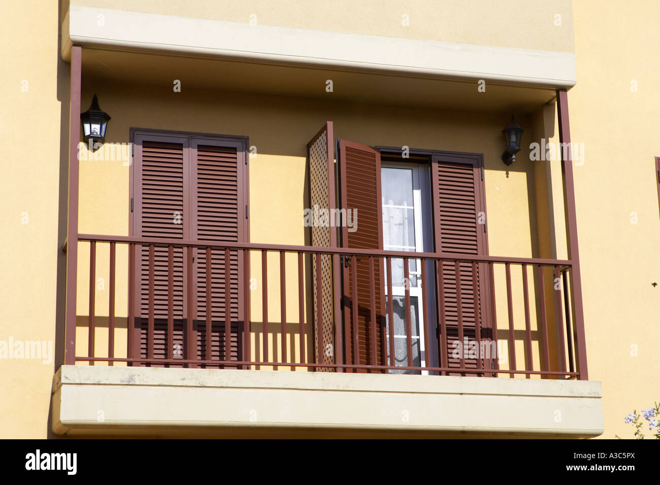 modern pvc sun shutter blinds on balcony doors and windows of house in ...