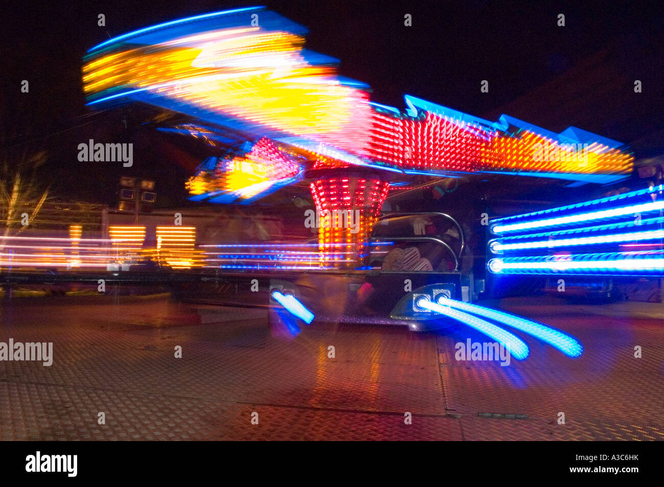 Fairground ride at night Stock Photo - Alamy