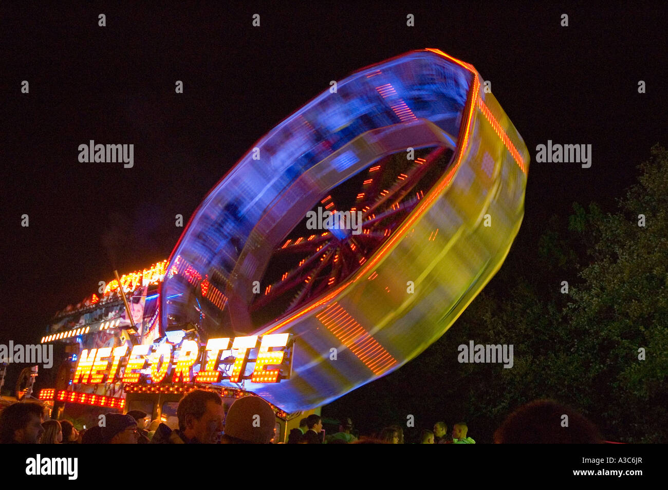 Fairground ride at night Stock Photo - Alamy