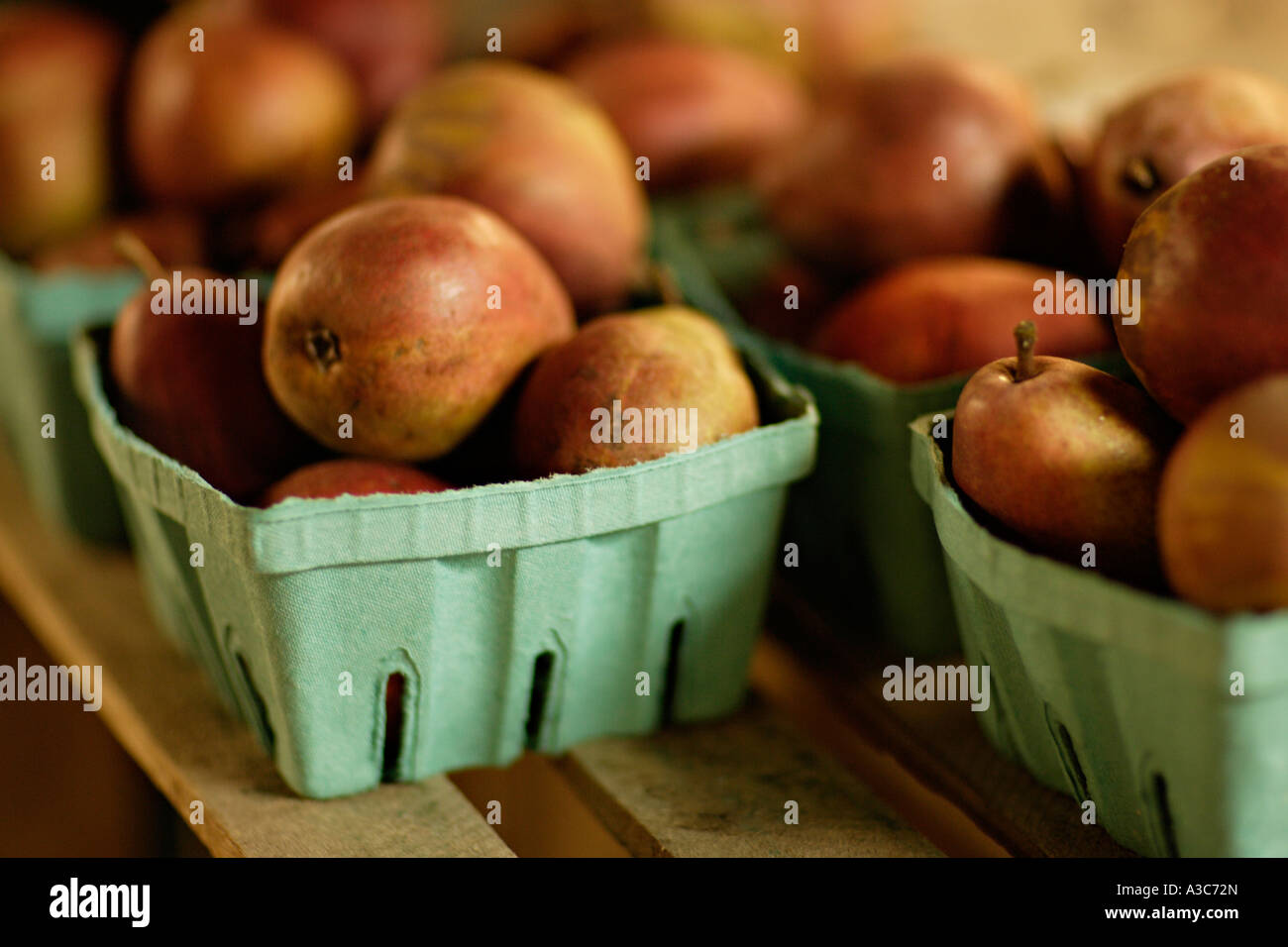 Pears in super market's produce isle Stock Photo - Alamy