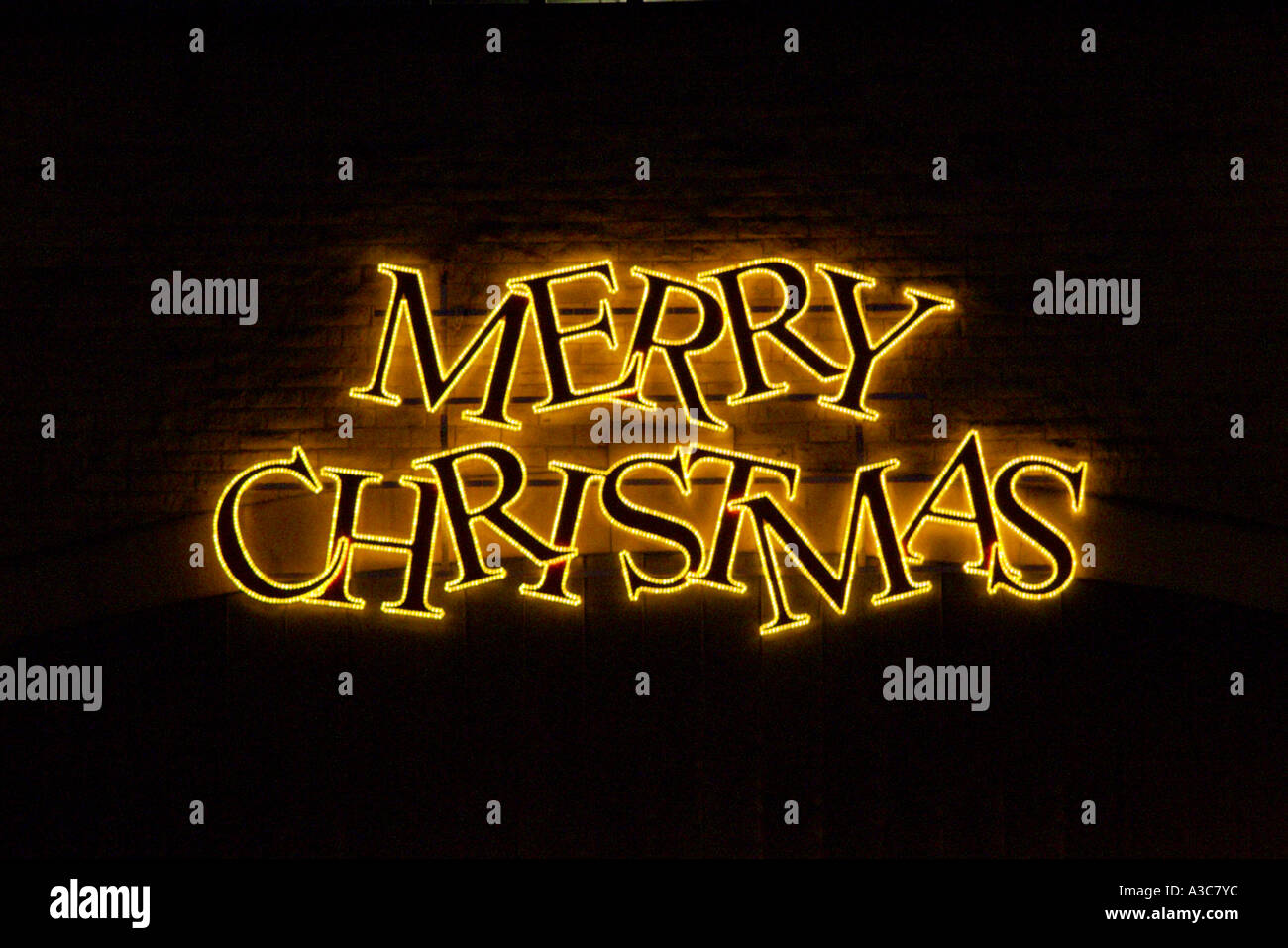 Happy Christmas sign on the side of the shopping centre Stock Photo - Alamy