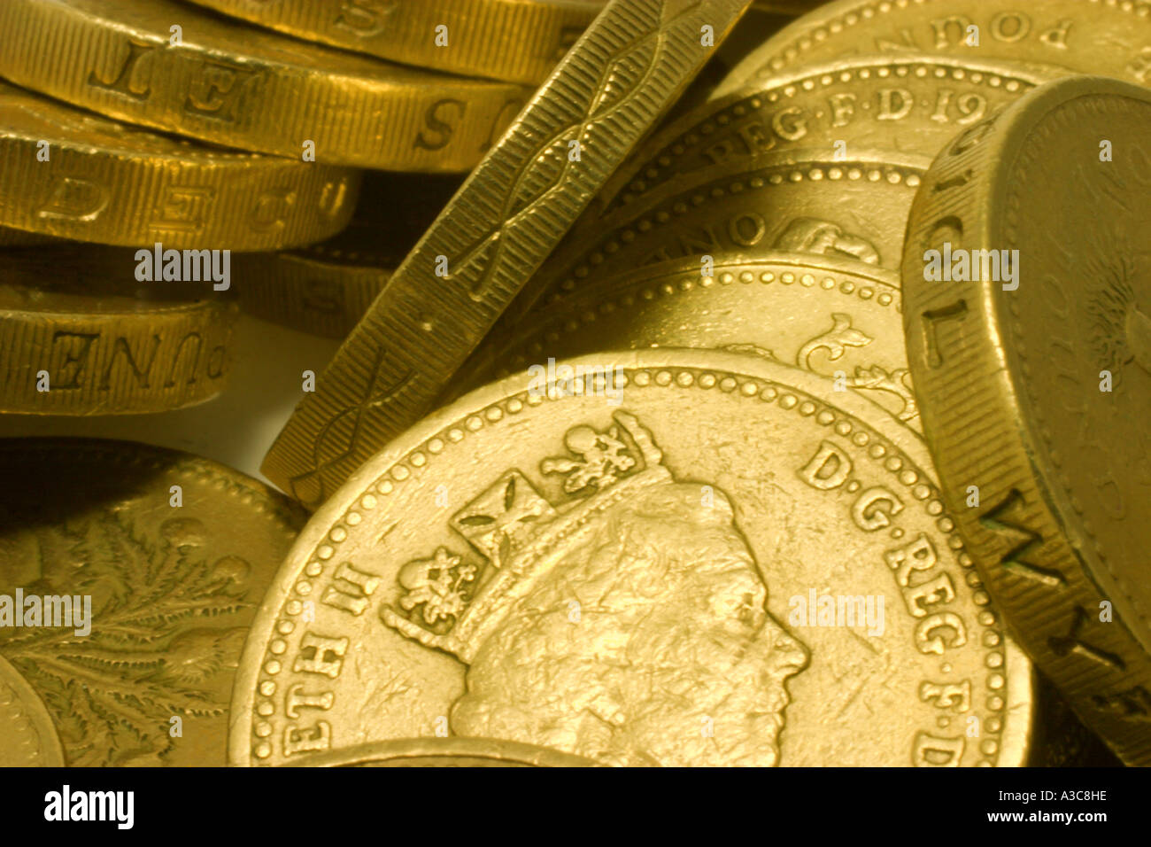 Pile of British pound coins Stock Photo - Alamy