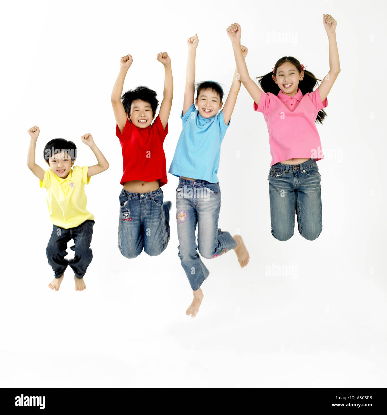 Children jumping up Stock Photo - Alamy