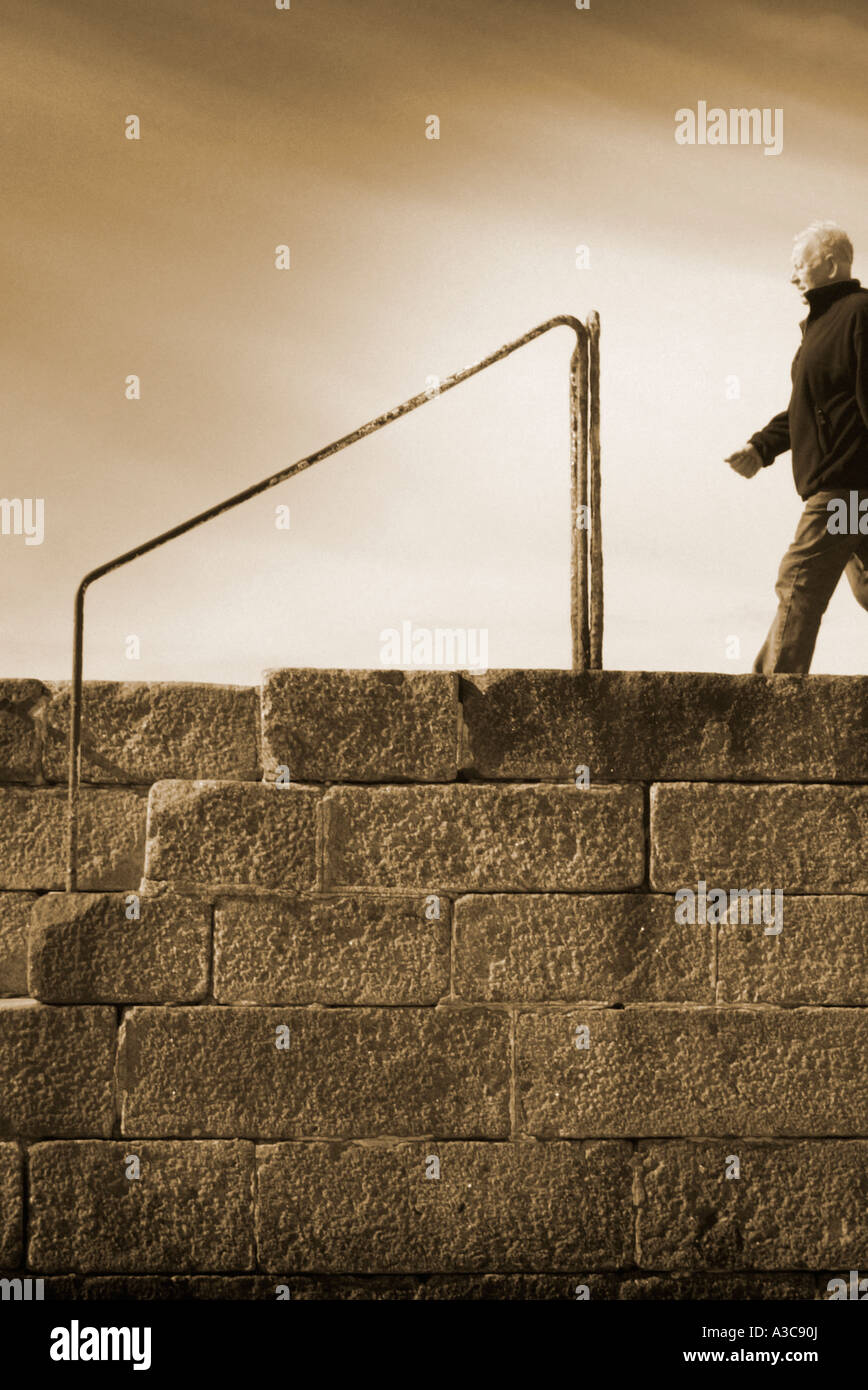man walking towards steps Stock Photo - Alamy