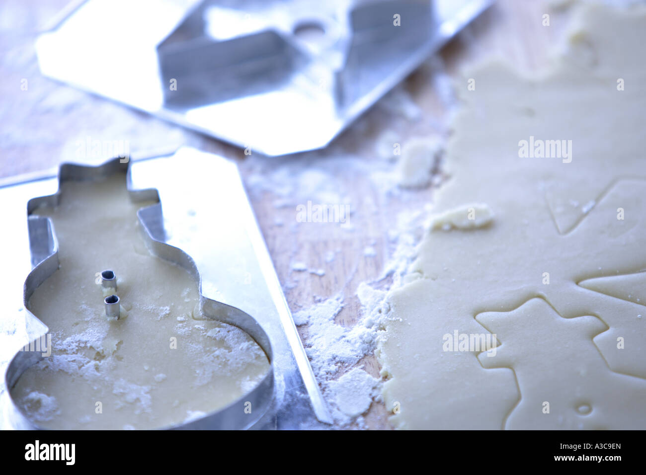 Christmas cookie cutters and cookie dough Stock Photo - Alamy