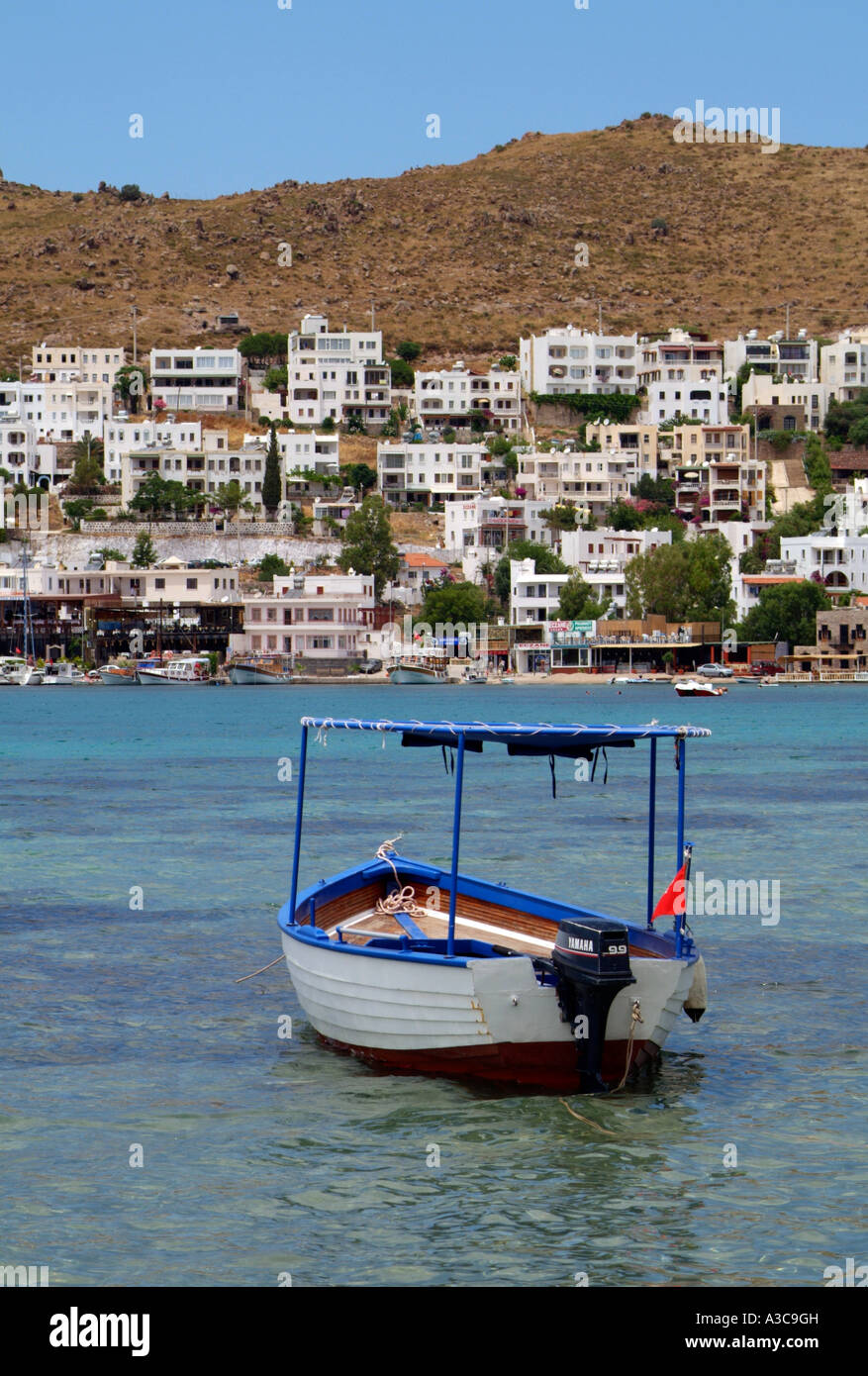 small boat floating in Karaincir harbour Turkey Stock Photo - Alamy