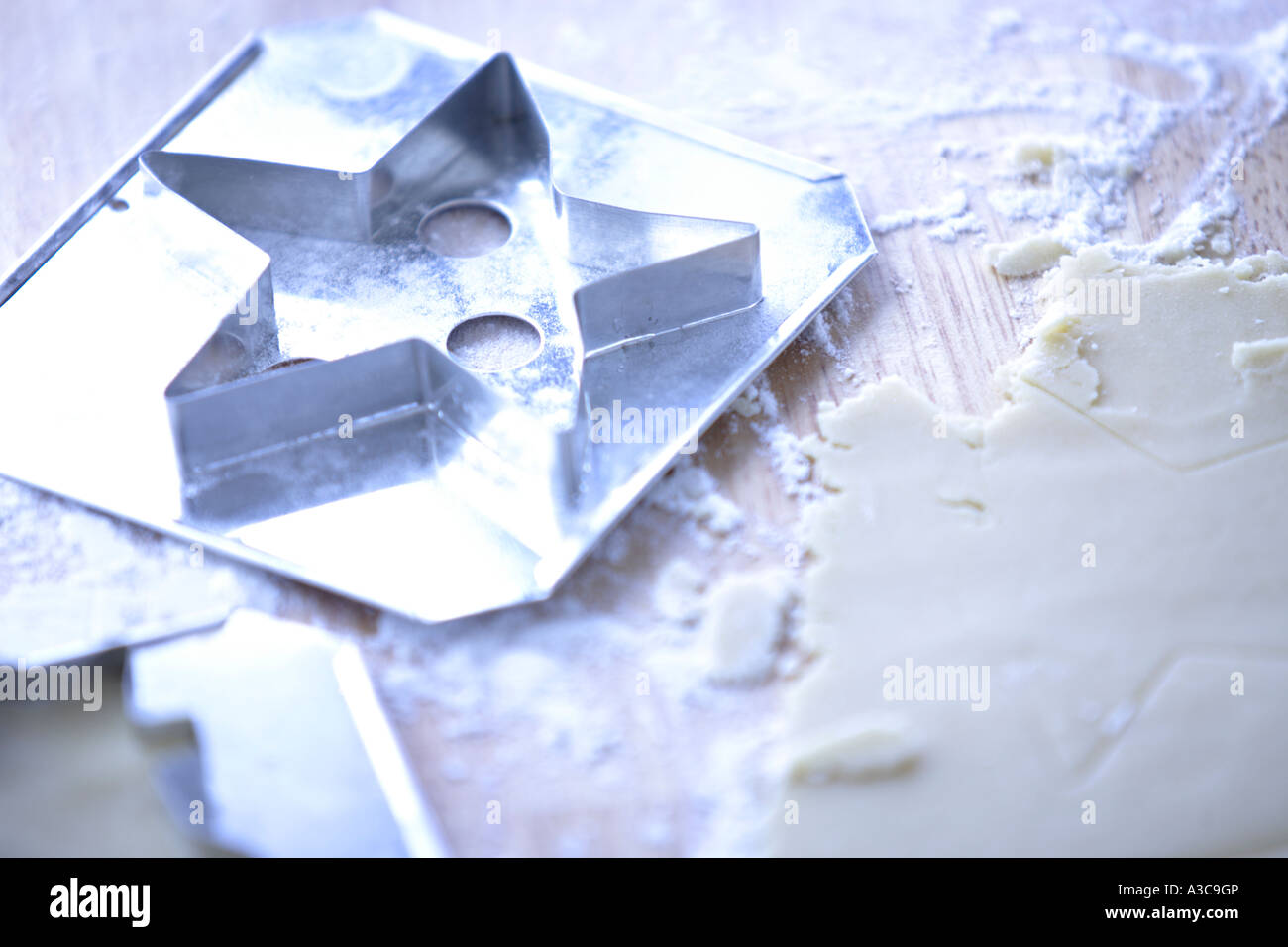 Christmas cookie cutters and cookie dough Stock Photo - Alamy