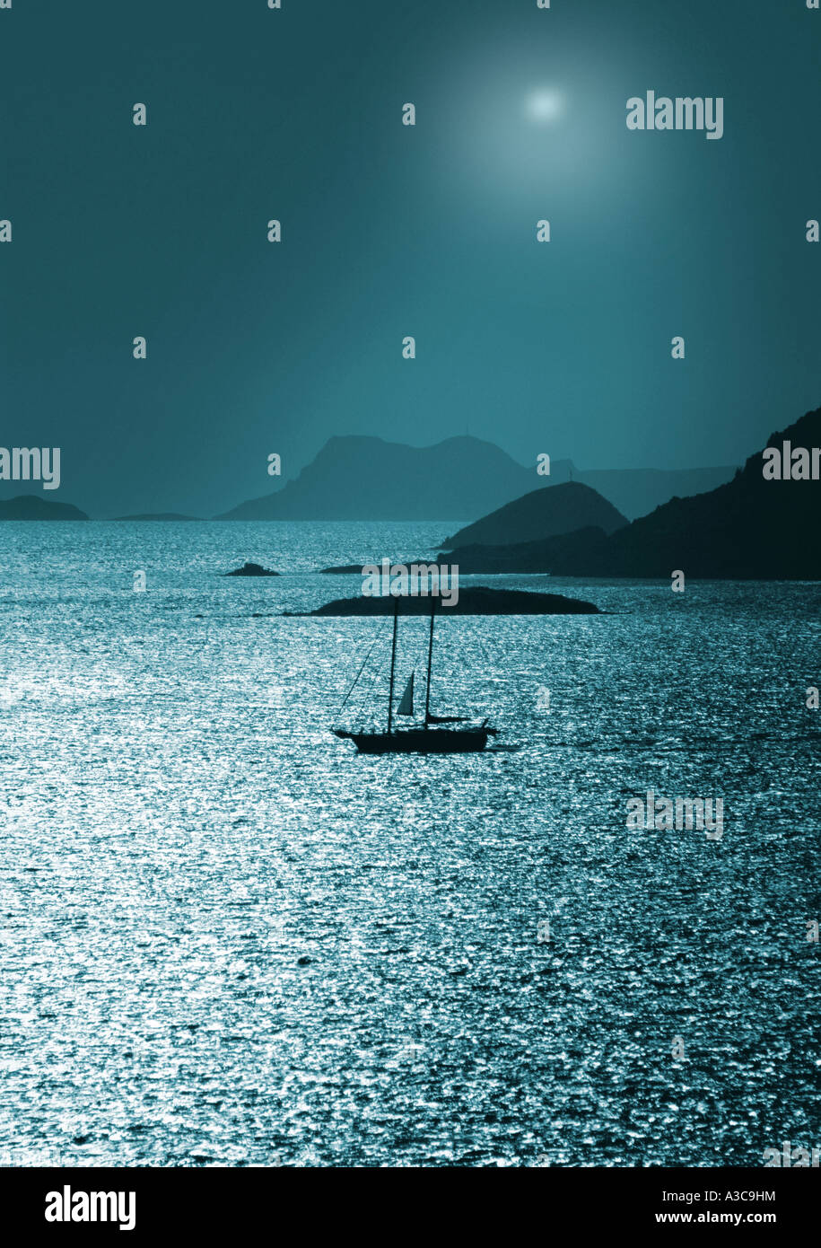 boat sailing in moonlight past Kos Stock Photo - Alamy