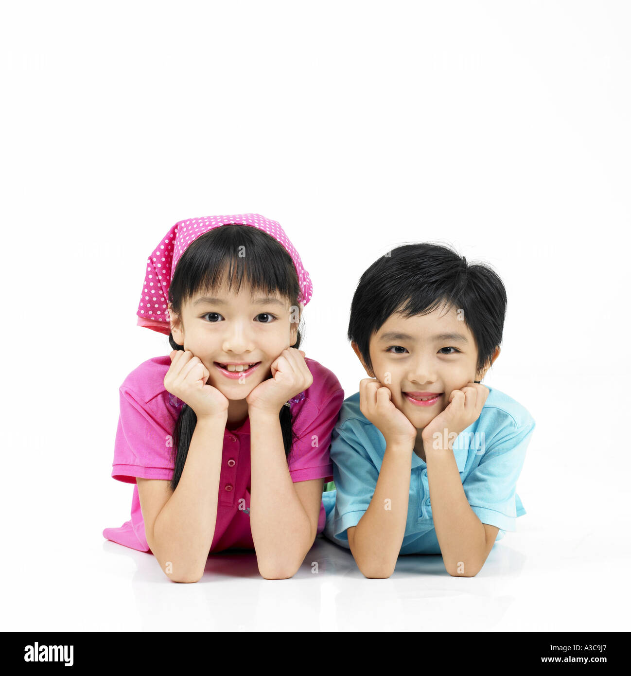 Children lying prone Stock Photo - Alamy