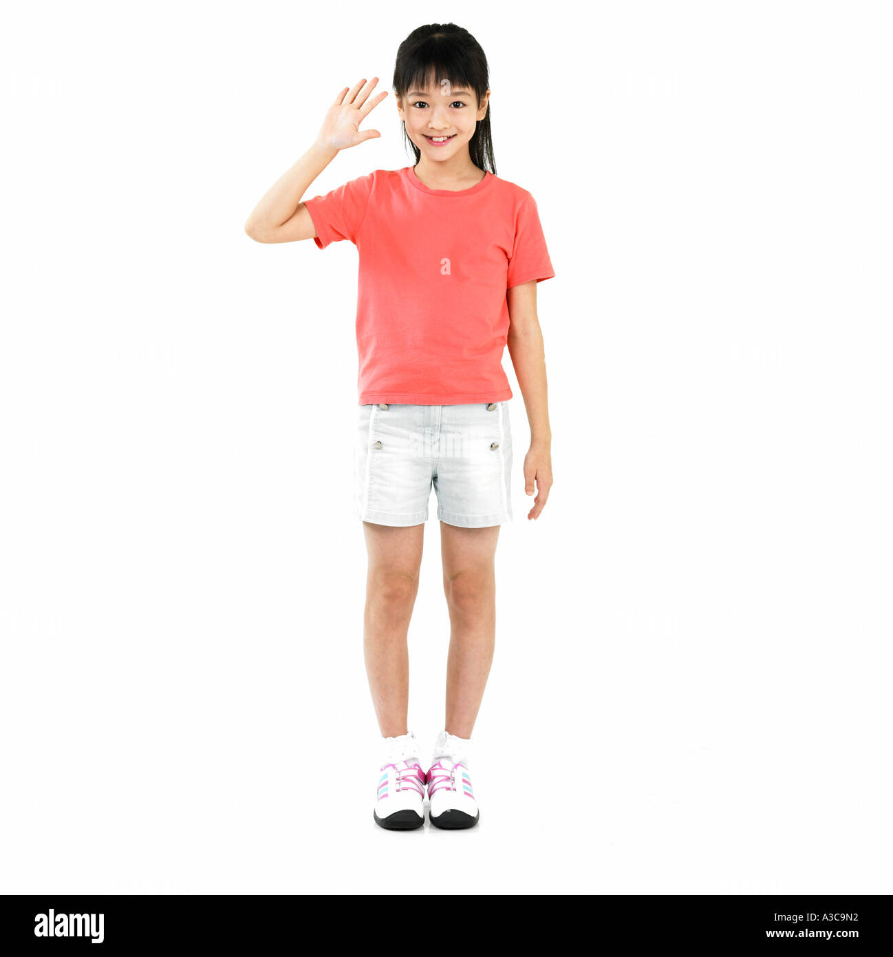 A girl with having a hello pose Stock Photo - Alamy