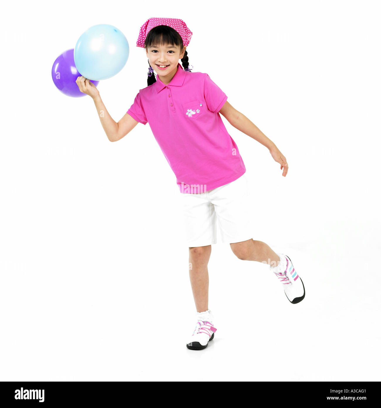 irl holding blue and purple balloon Stock Photo - Alamy