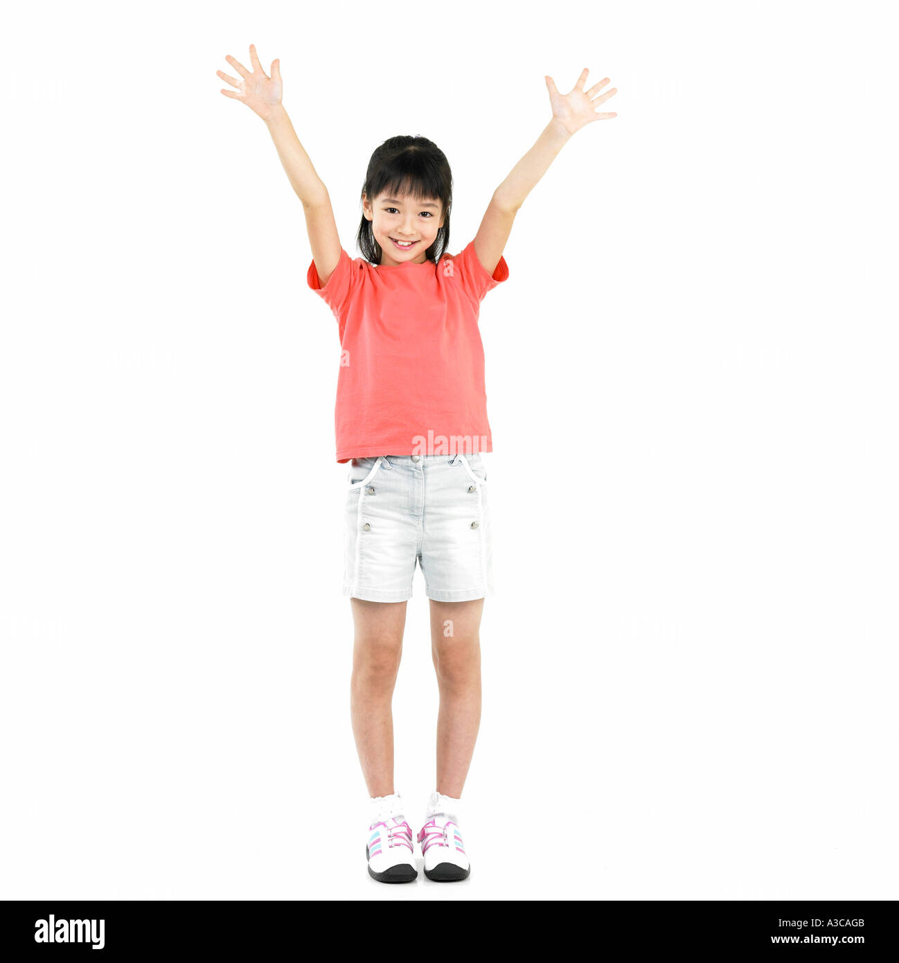 girl with two arms up for cheering Stock Photo - Alamy