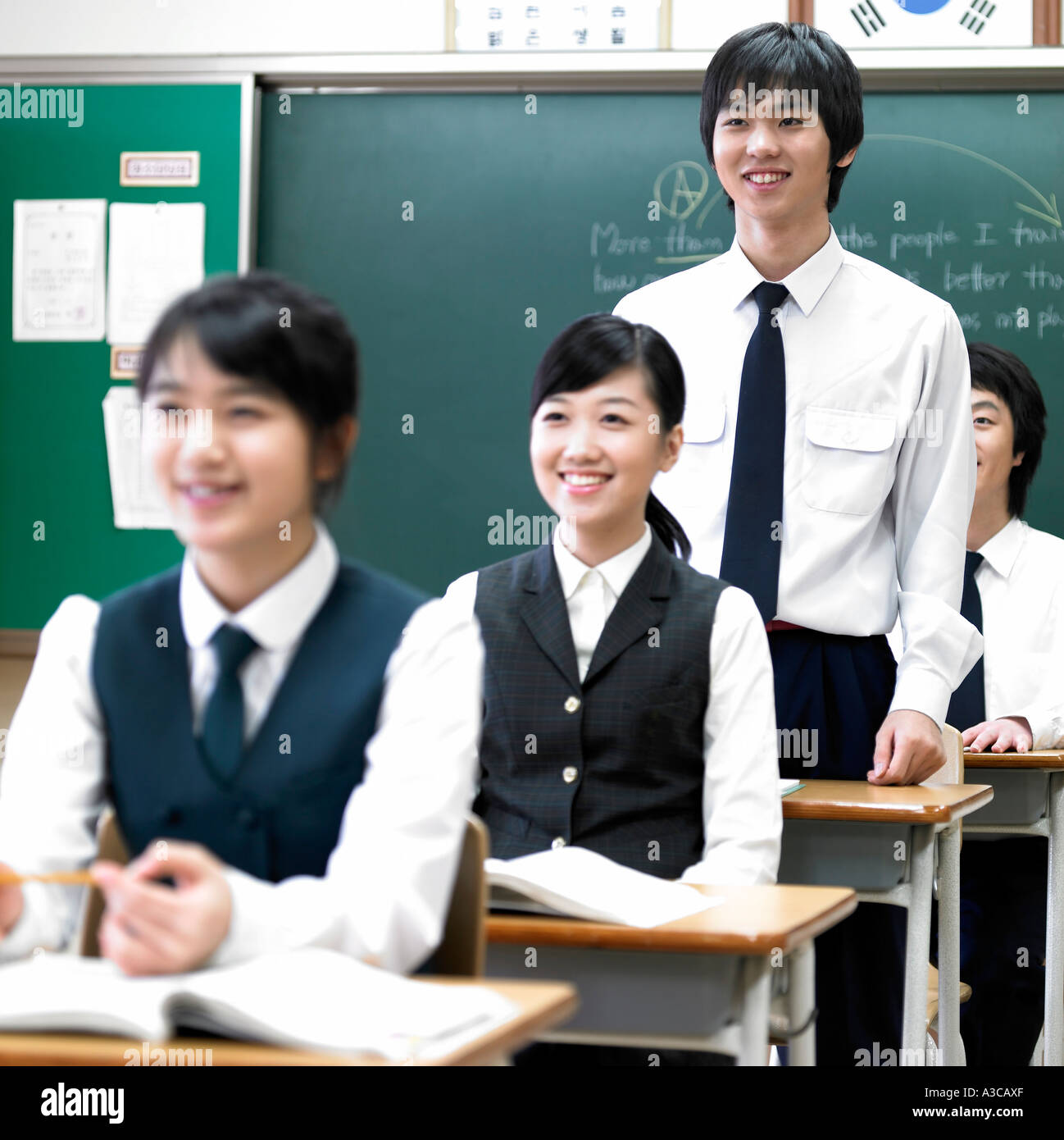 A student standing in his place Stock Photo - Alamy