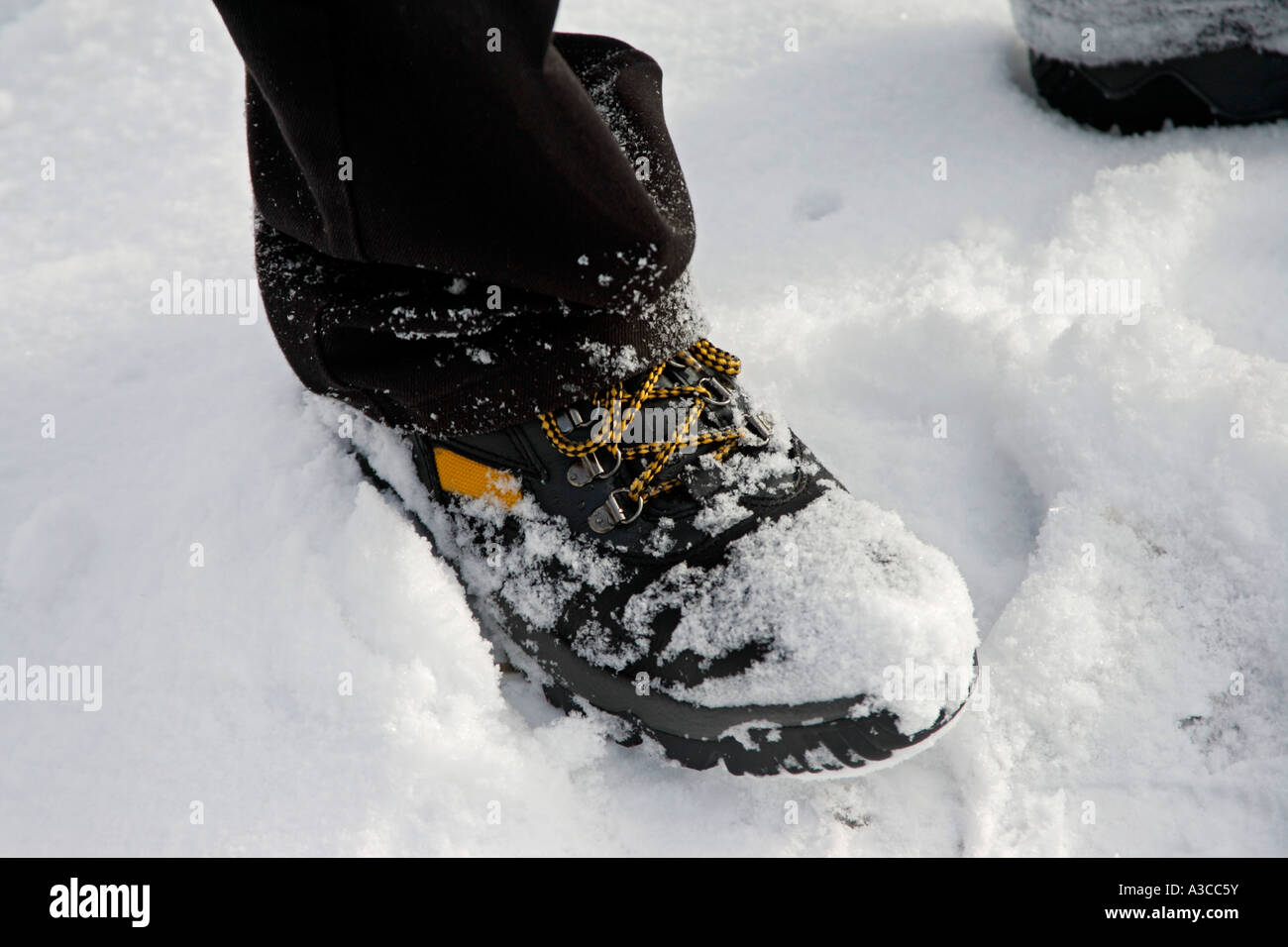 shoe snow covered Stock Photo - Alamy