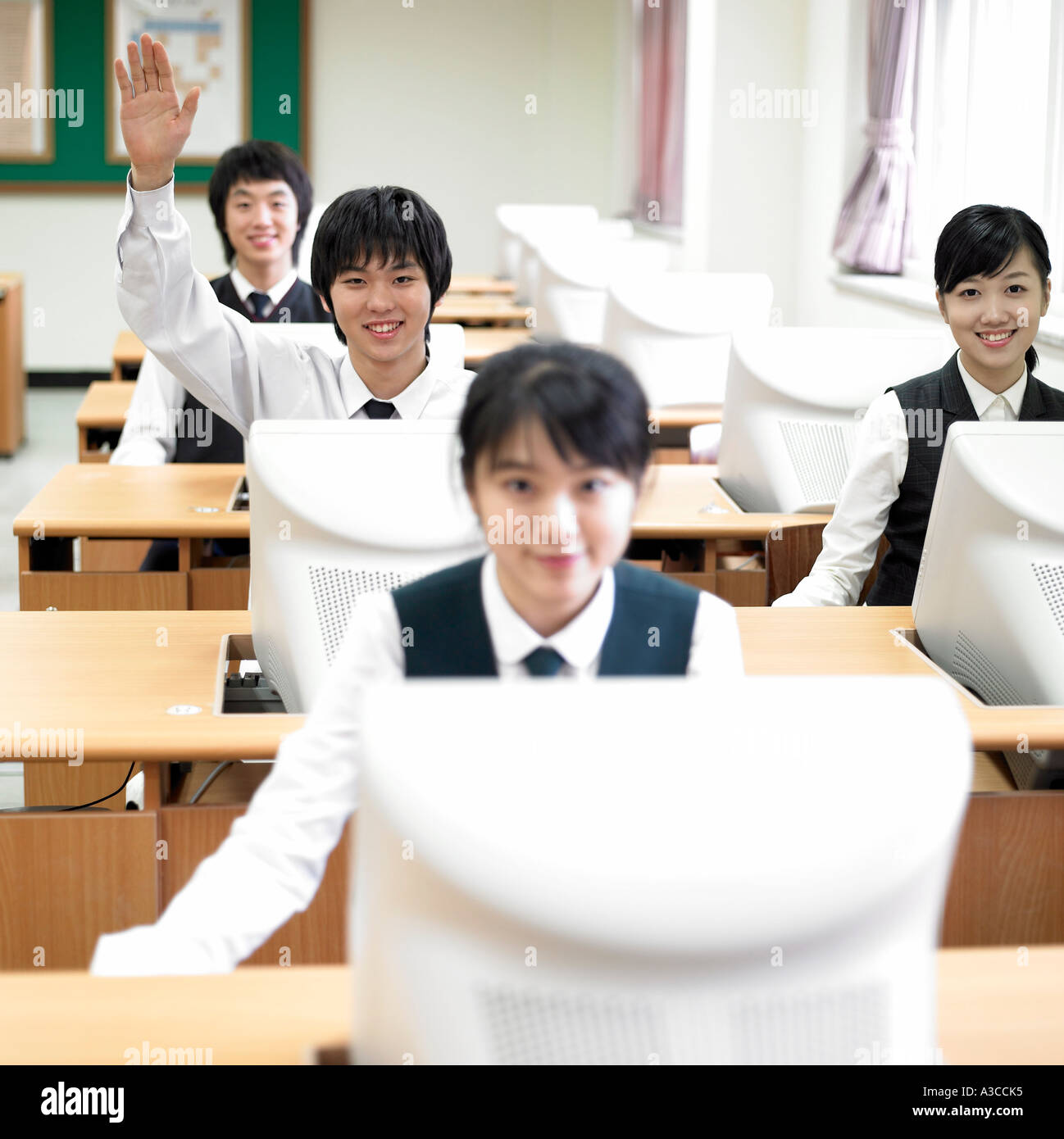 asian students taking computer lesson Stock Photo - Alamy